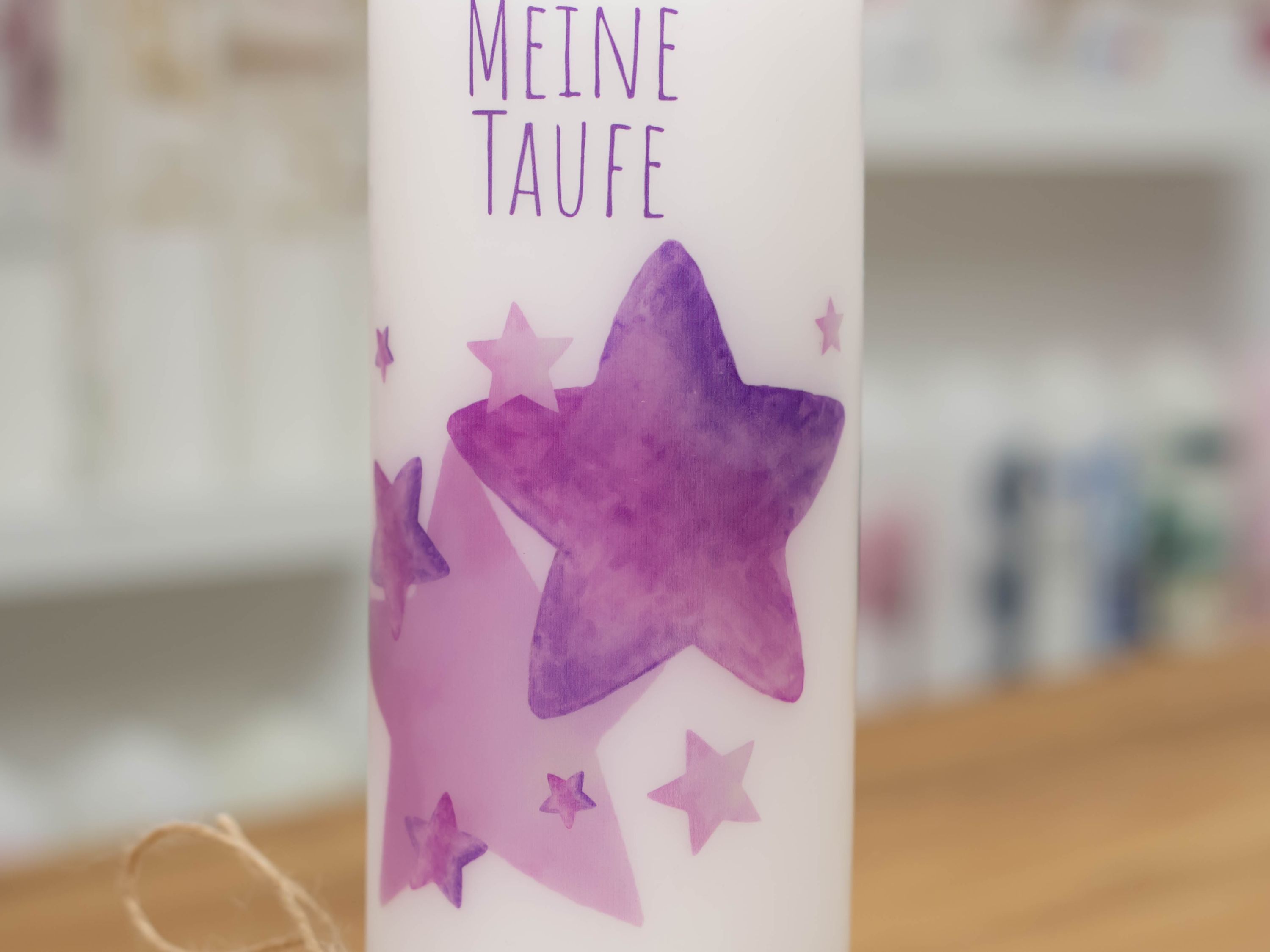 Taufkerze mit Designdruck PURPLE STAR | meinkerzenshop.de